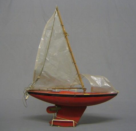 A red painted Triang metal pond yacht | 6th April 2005 | Denhams