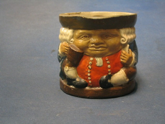 A Doulton Toby jug of seated Toby Philpot with | 1st June 2005 | Denhams