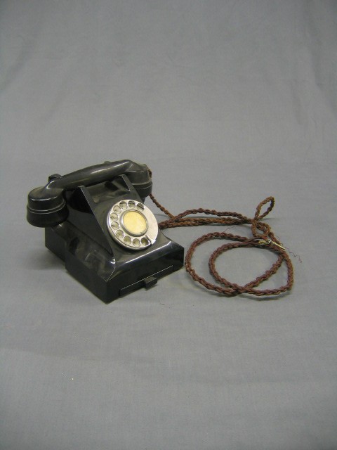 An old black Bakelite dial telephone, the base marked | 27th July 2005 ...