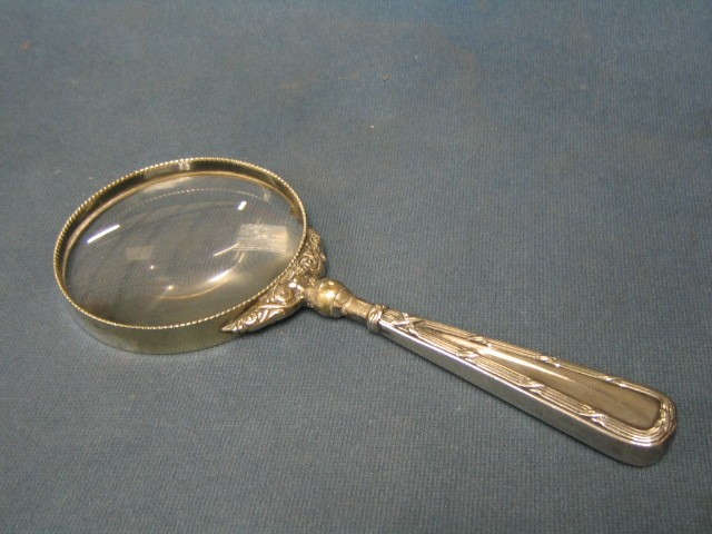 A circular magnifying glass (slight chip) with silver | 24th August ...