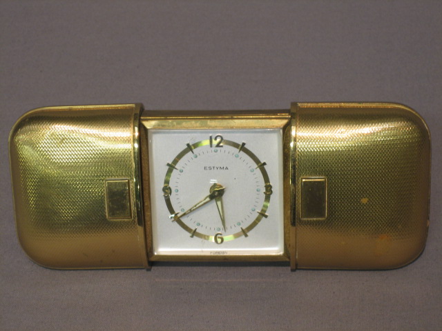 A 1940's German Estyma travelling clock contained in a | 14th February ...