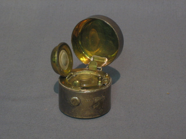 An Edwardian cylindrical silver travelling ink well | 4th July 2007 ...