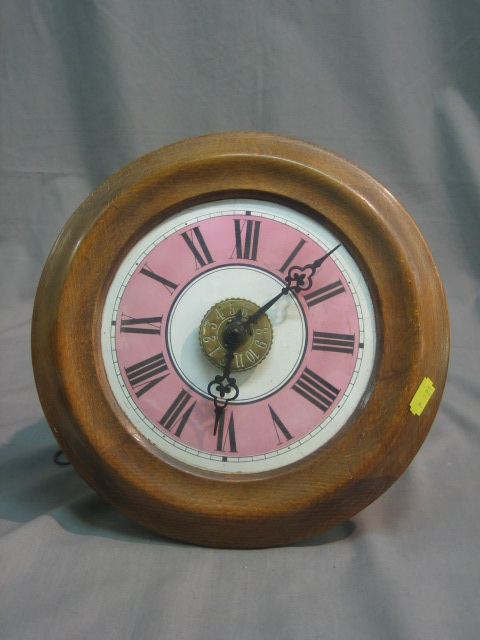 A Postman's alarm clock with puce and white enamelled | 1st October ...