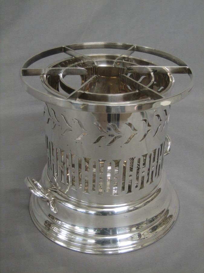 A cylindrical silver plated twin handled flambe stove, | 9th June 2010 ...
