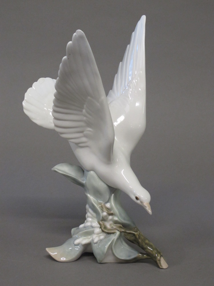A Lladro figure of a diving dove 11" | 3rd October 2012 | Denhams