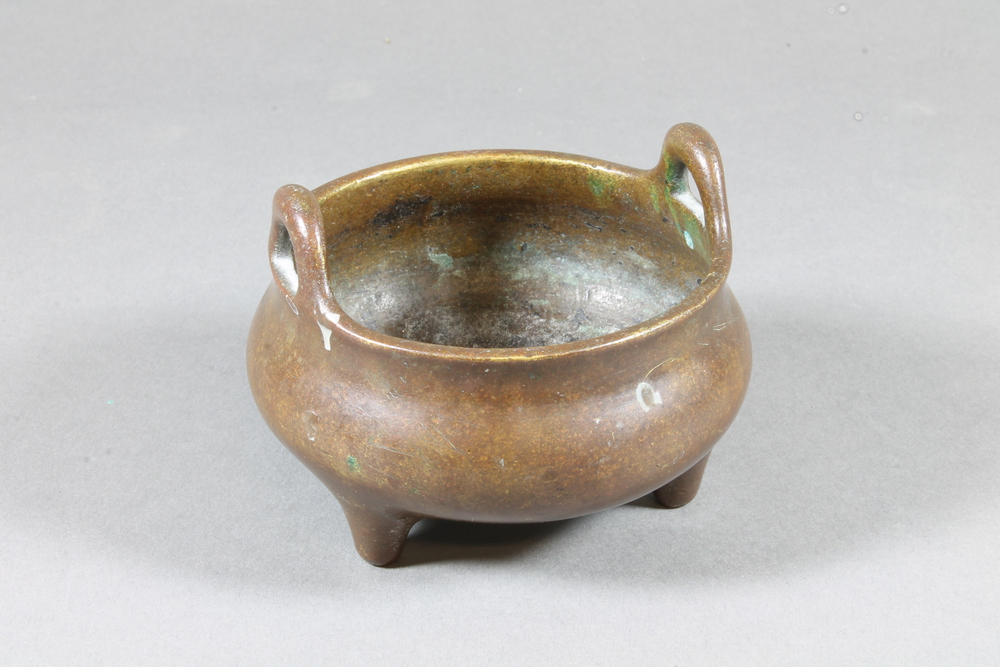 A Chinese bronze twin handled incense sensor, raised | 10th July 2013 ...