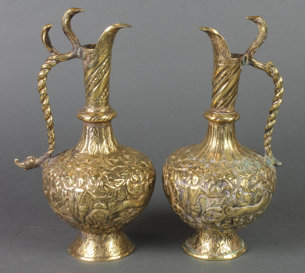 A pair of Benares brass embossed ewers with cobra | 3rd June 2015 | Denhams