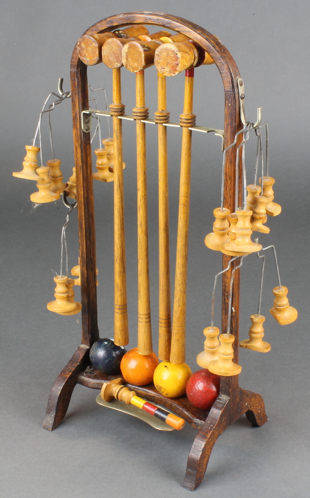 A table top croquet set comprising 4 turned mallets, | 21st October ...