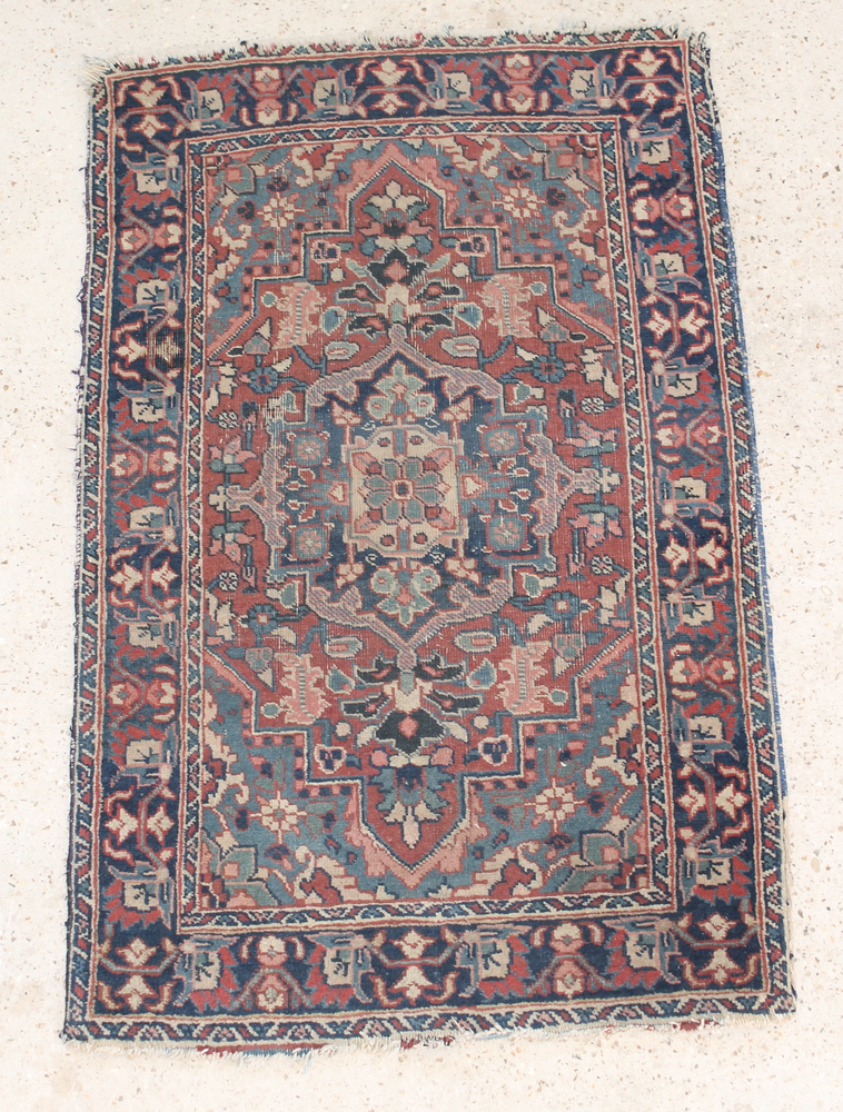 A Persian Toyserkan brown and blue ground rug with | 11th May 2016 ...