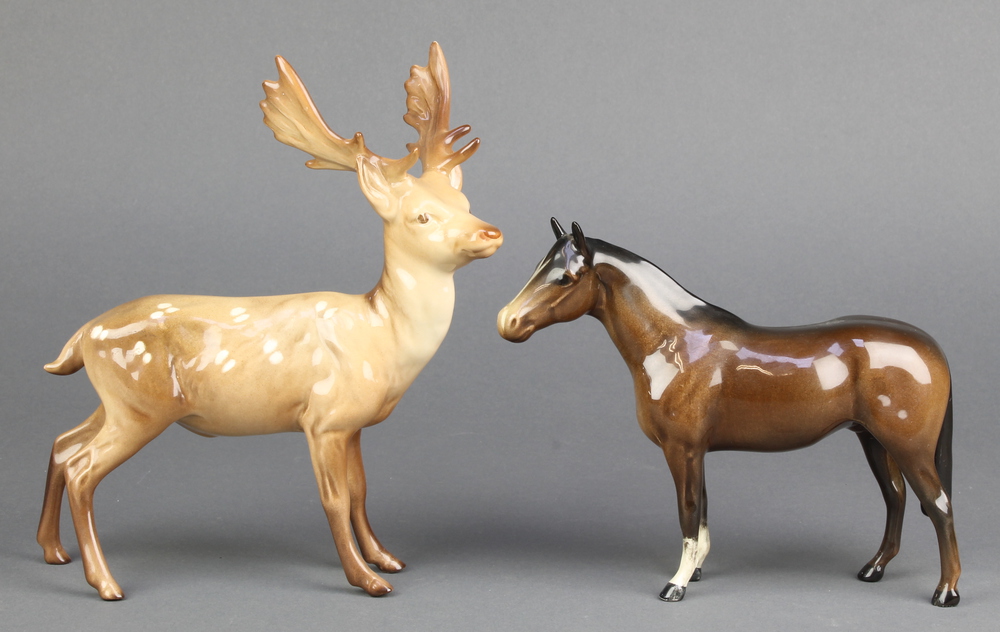 A Beswick figure of stag standing, no.981 8" together | 21st December ...