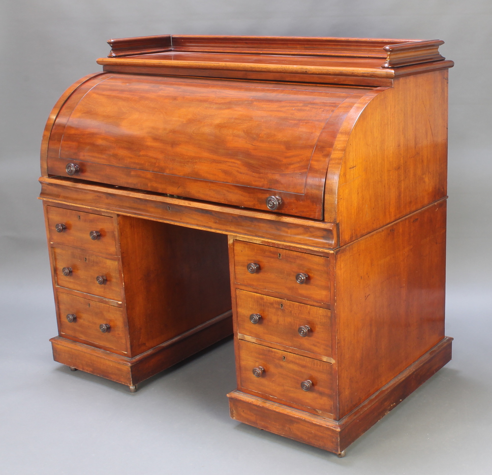 A Victorian mahogany cylinder bureau with | 19th April 2017 | Denhams