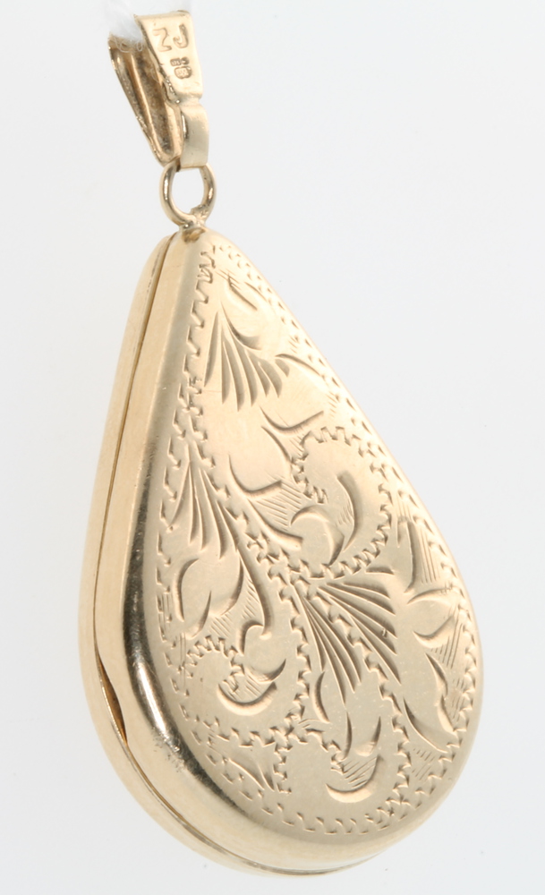 A 9ct pear shaped yellow gold locket with chased | 14th June 2017 | Denhams