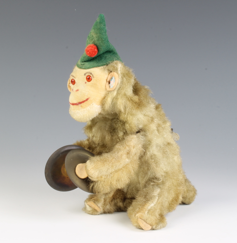 A clockwork figure of a monkey with cymbals, the ear | 5th December ...