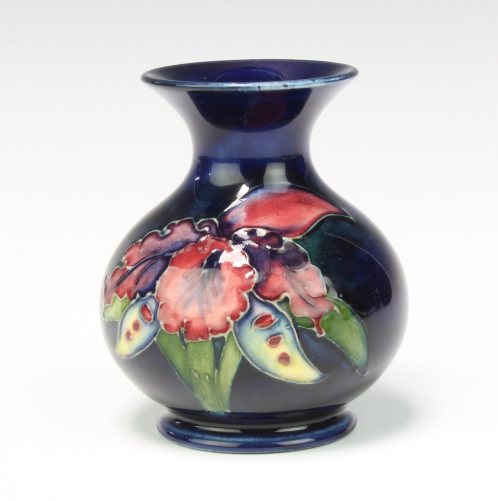 A Moorcroft bulbous vase decorated the iris pattern on | 31st July 2019 ...