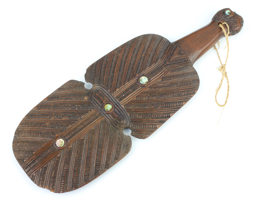 A carved wooden Maori Kotiate short hand club, "liver | 23rd October ...