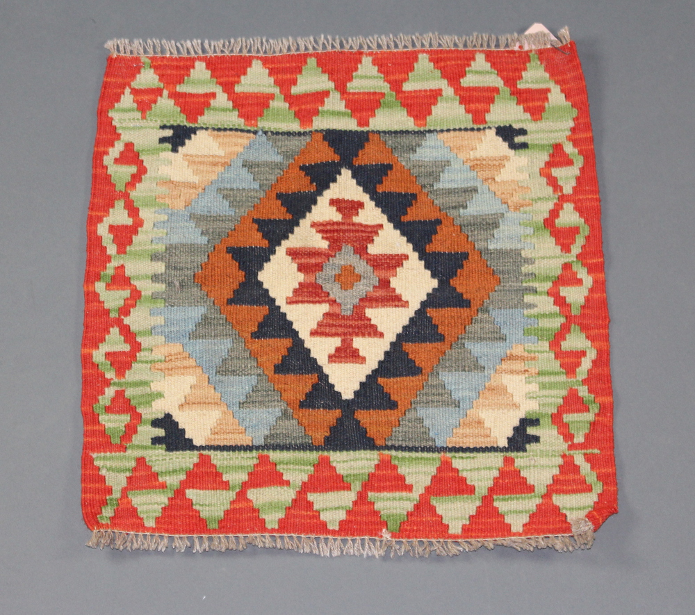 A brown terracotta black, green and orange Chobi Kilim | 26th February ...