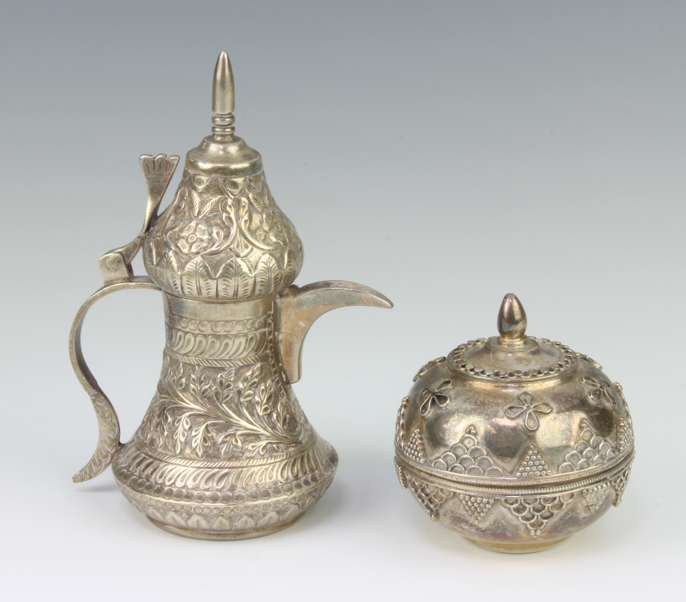 A Turkish miniature silver coffee pot together with a | 12th August ...