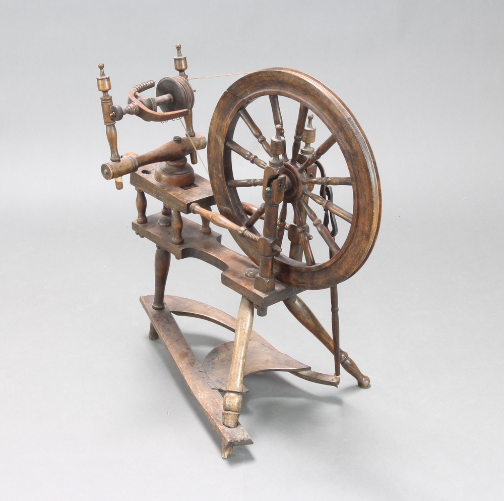 A 19th/20th Century turned beech spinning wheel 71cm h | 17th June 2021 ...