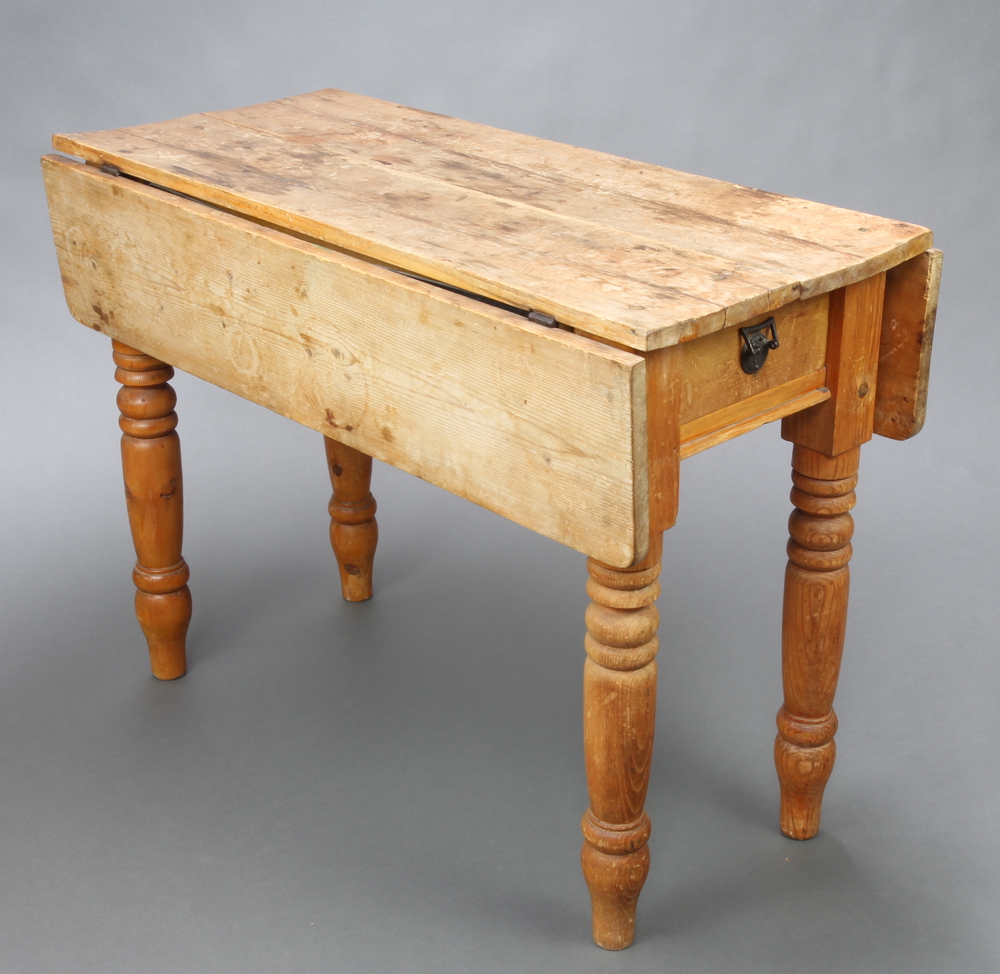 A Victorian pine drop flap kitchen table fitted a | 15th July 2021 ...