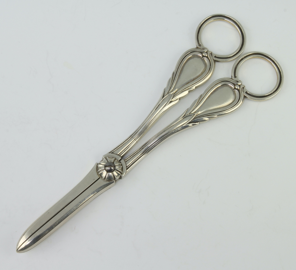 A pair of silver lily pattern grape scissors London | 15th July 2021 ...