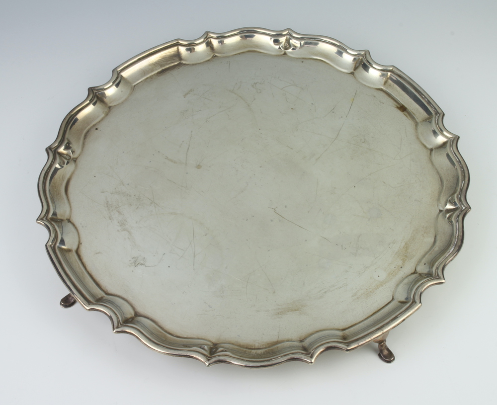 A silver salver with pie crust rim on pad feet, | 21st September 2022 ...
