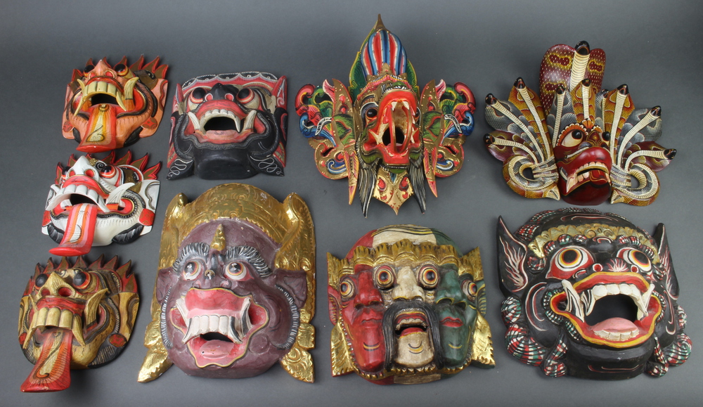 Nine various Eastern carved and painted wooden masks | 21st September ...