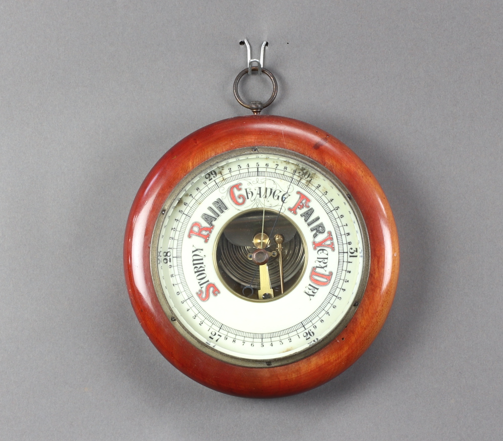 An aneroid barometer with porcelain dial contained in | 19th October ...