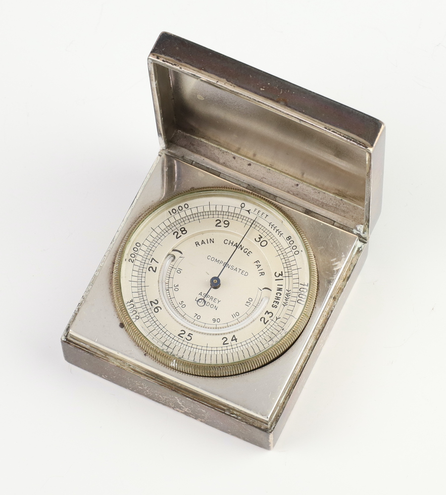 A silver desk top barometer contained in a square case | 16th November ...