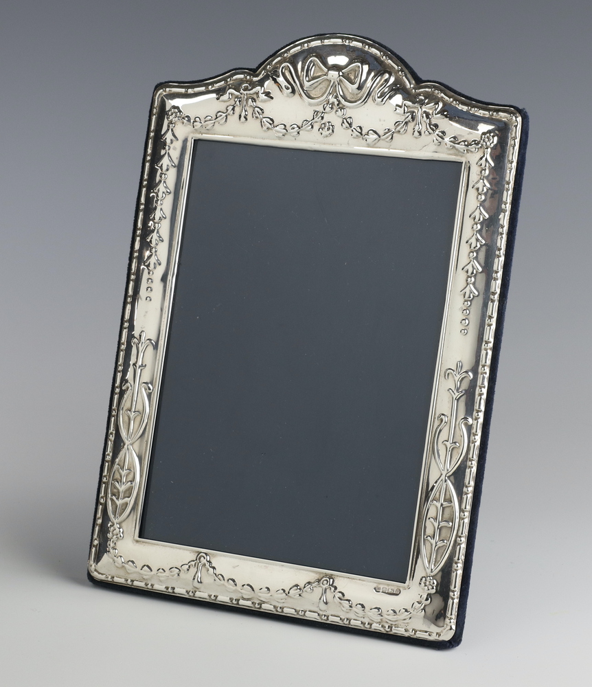 A modern repousse silver photograph frame with ribbons | 15th December ...