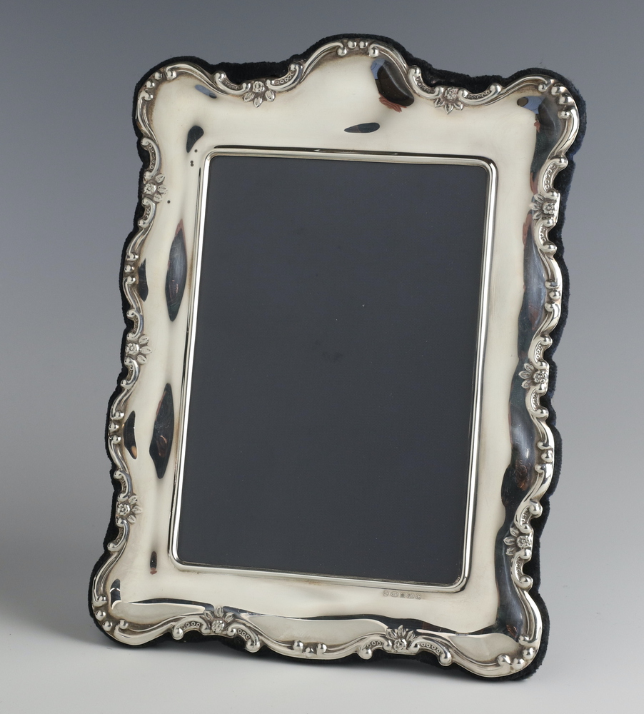 A modern silver repousse photograph frame 21cm x 15cm | 15th December ...