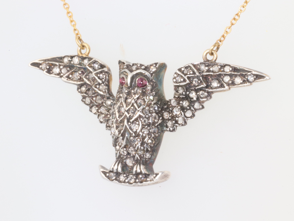 A yellow metal diamond and ruby set owl pendant 42mm | 25th January ...