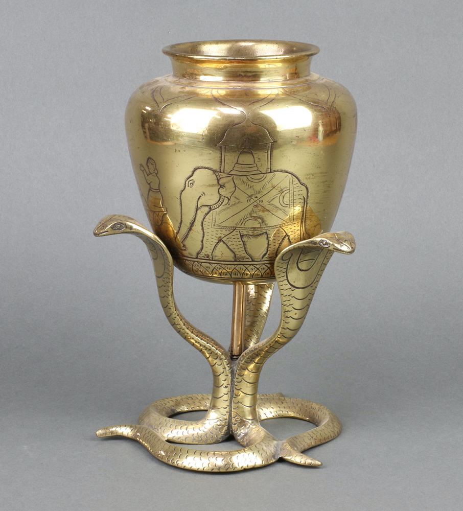 A Benares polished brass vase supported by 3 cobras | 23rd February ...