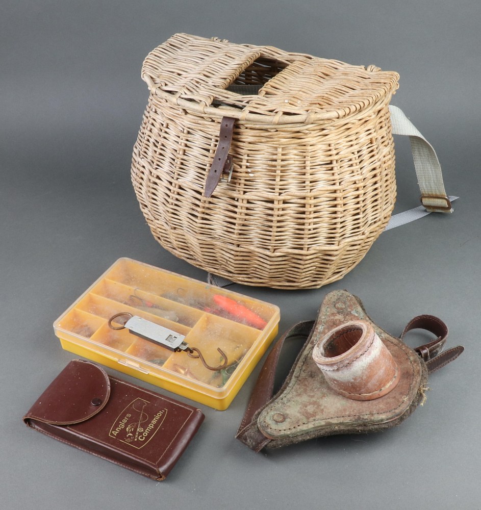 A basket fishing creel containing a collection of | 23rd February 2023 ...