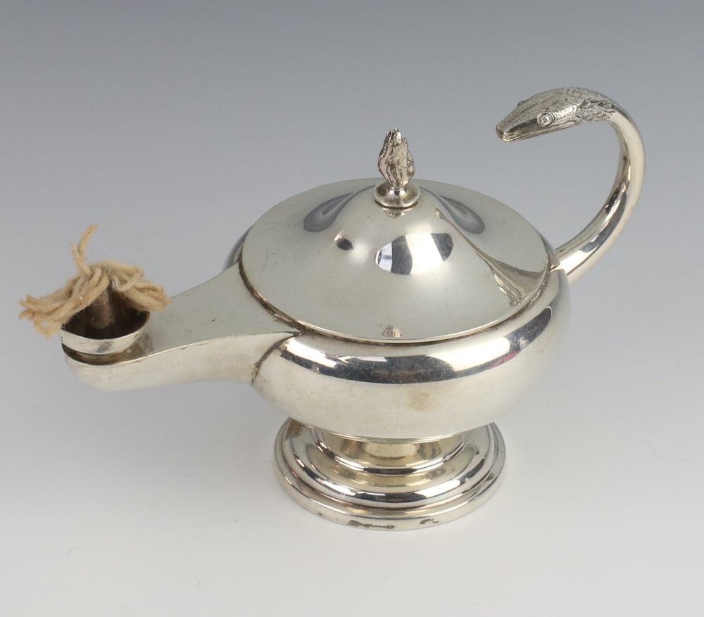 A silver cigar lighter in the form of a Roman oil lamp | 23rd February ...