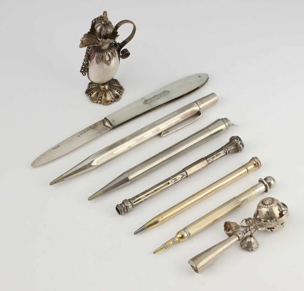 A white metal rattle whistle, 5 pencils and 2 other | 17th May 2023 ...