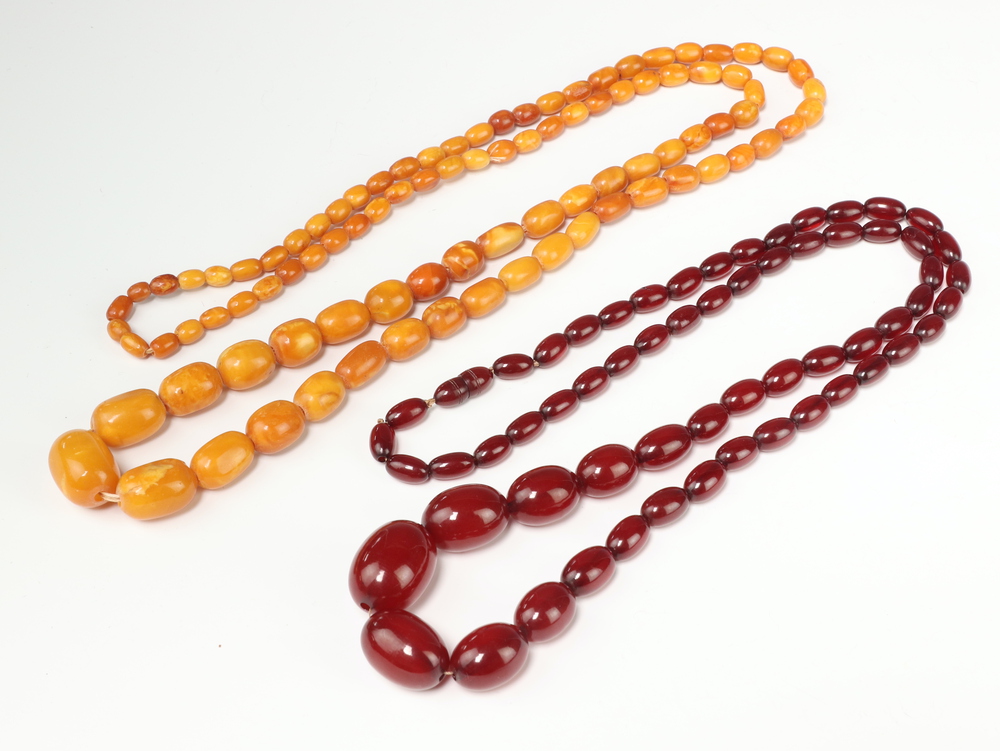 A red amberoid graduated bead necklace 88cm, a yellow | 14th June 2023 ...