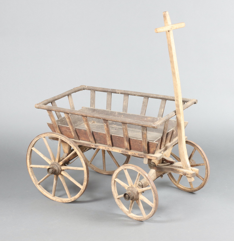 A 19th Century child's wooden pull along cart with | 13th July 2023 ...