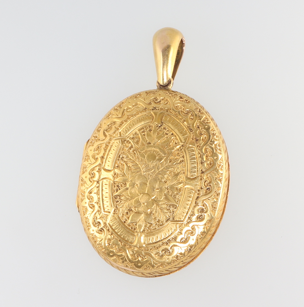 A Victorian engraved oval gilt locket 50mm | 10th August 2023 | Denhams
