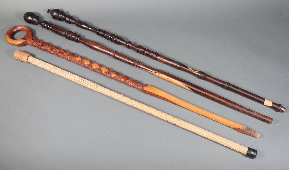 A turned lignum vitae stick, the cane top decorated a | 6th September ...