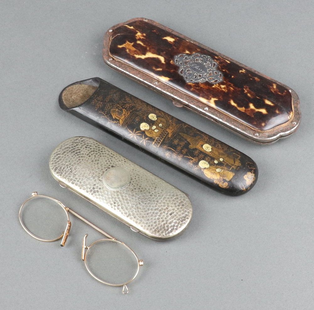 An oval planished metal spectacle case containing a | 29th November ...