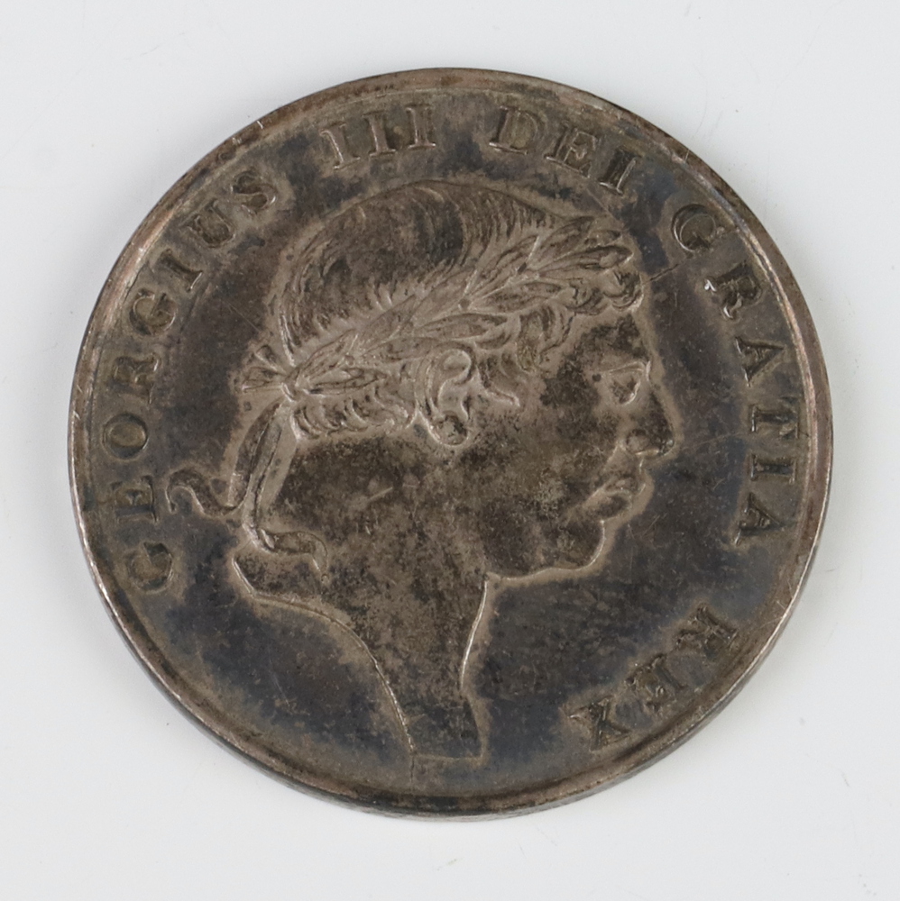 A British Sterling silver bank token of George III and | 25th January ...