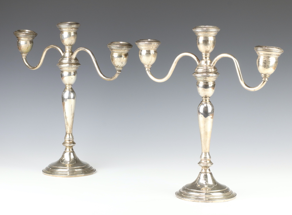 A pair of sterling silver 3 light candelabra, | 21st March 2024 | Denhams