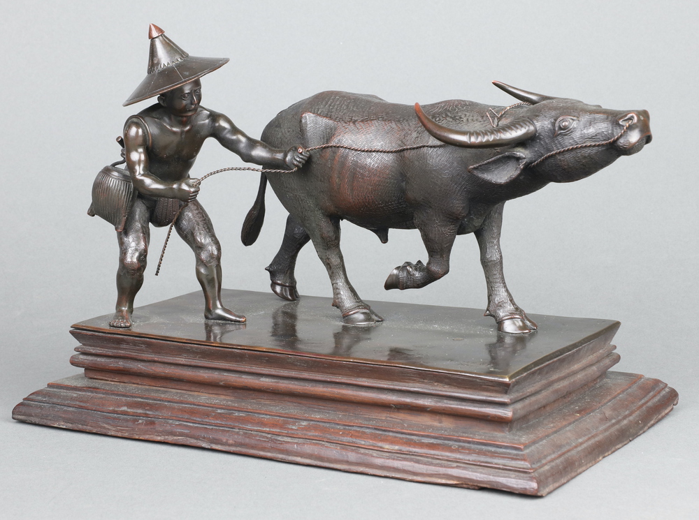 A Burmese bronze group of an Oriental farmer with | 21st March 2024 ...