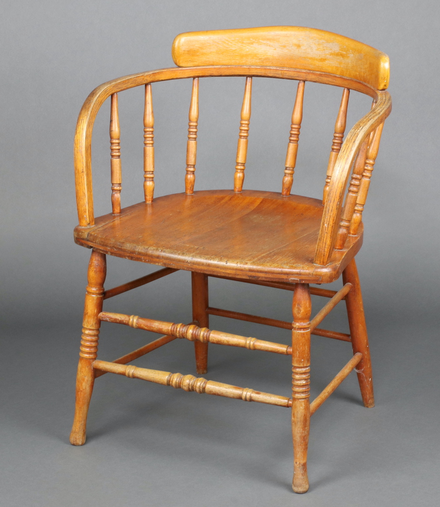 An Edwardian beech and elm tub back chair with spindle | 21st March ...