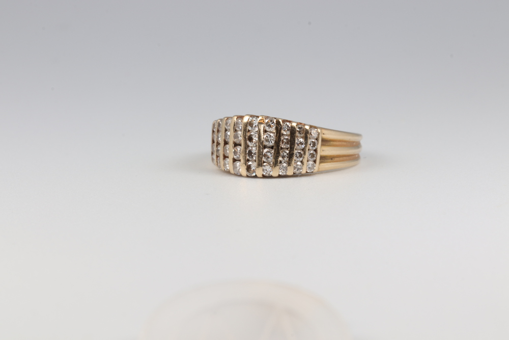 A yellow metal 585 diamond set 4 row ring, 3.6 grams, | 17th April 2024 ...