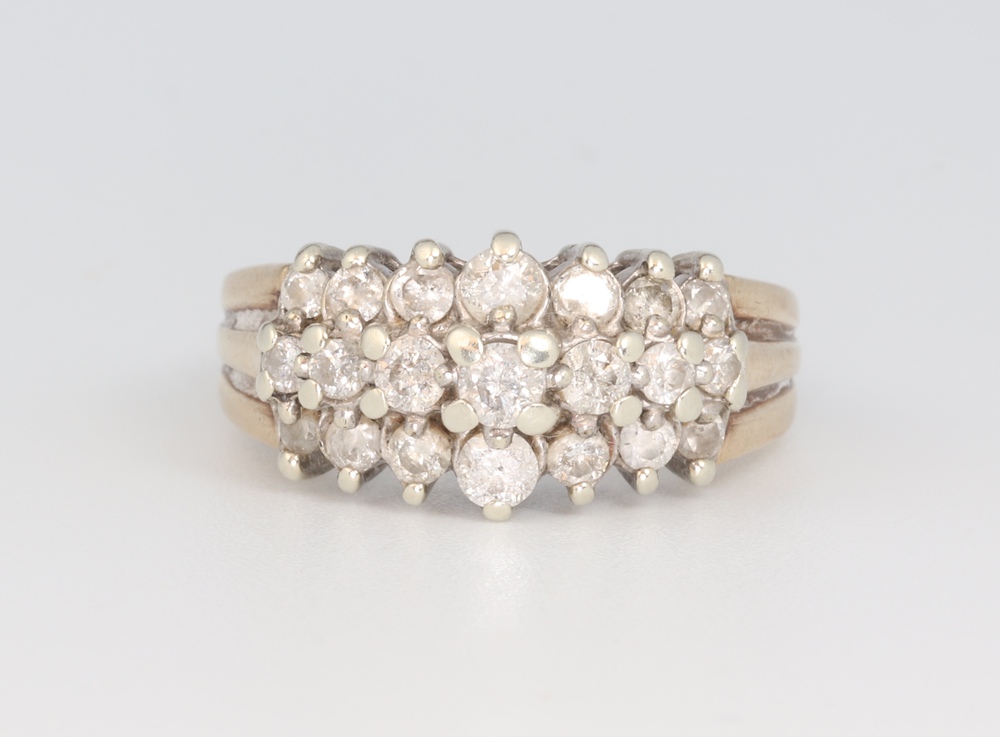 A yellow metal 9ct ring set with 21 brilliant cut | 17th April 2024 ...