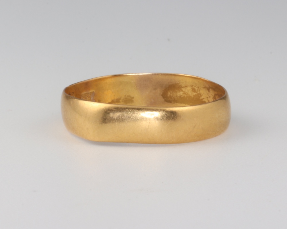 A 22ct yellow gold wedding ring size Q, 2.6 grams | 10th July 2024 ...