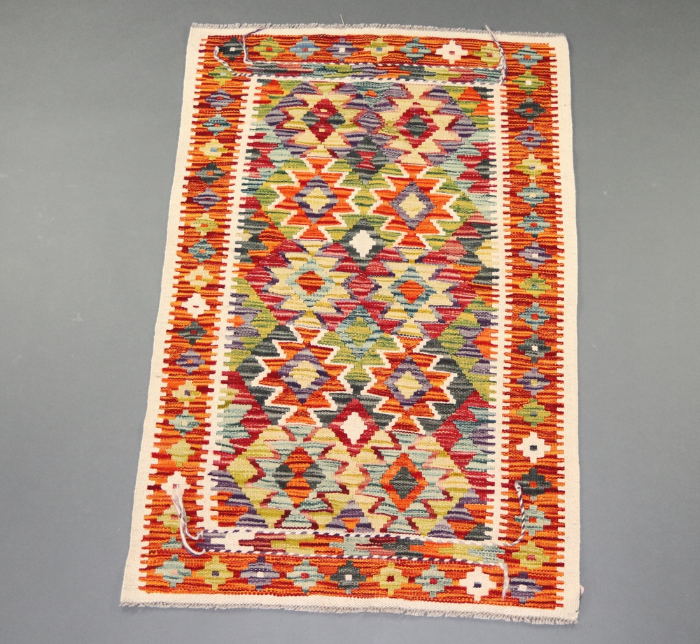 A green, yellow and orange ground Chobi Kilim rug with | 10th July 2024 ...