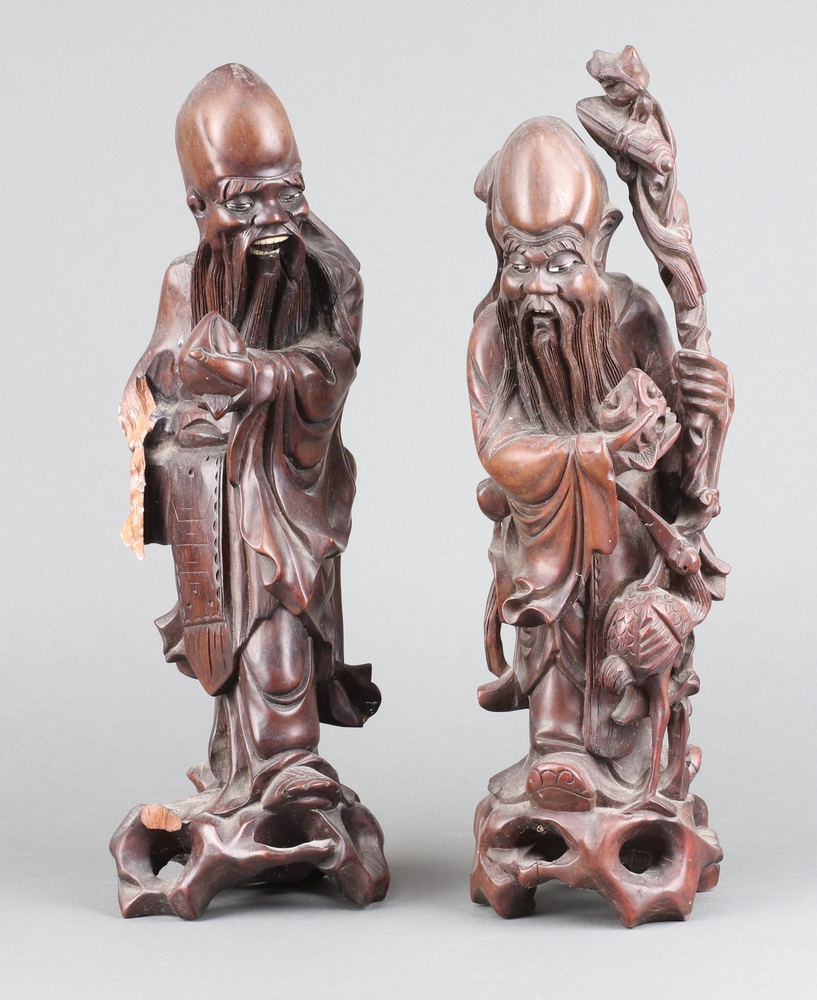 A pair of Chinese carved root wood figures of standing | 30th October ...