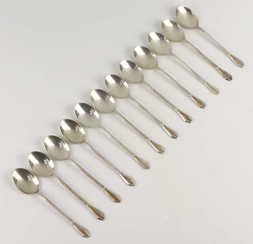 Twelve silver coffee spoons with fancy handles, | 30th October 2024 ...